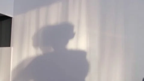 little smiling boy playing with shadows ... | Stock Video | Pond5