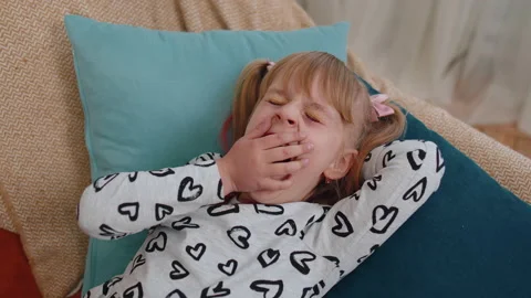 Little tired lazy sleeping children girl... | Stock Video | Pond5