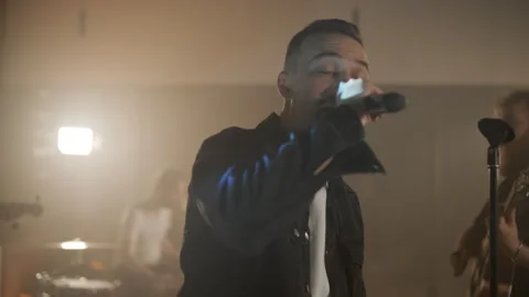 Live Band Performance with Singer, Bassi... | Stock Video | Pond5