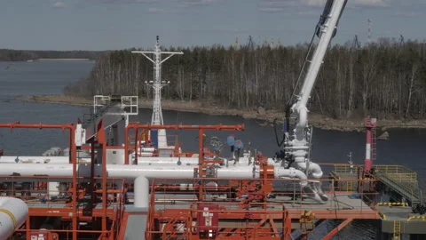 LNG tanker loading with cargo arm | Stock Video | Pond5
