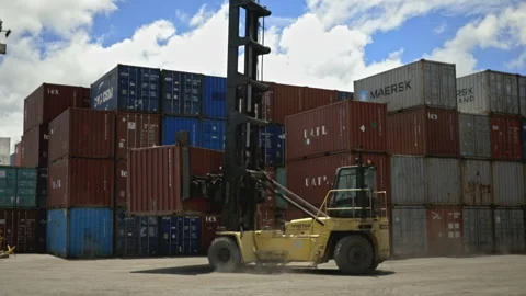 Loaded container handler packing a shipp... | Stock Video | Pond5