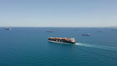 Loaded MSC Container ship leaving a busy... | Stock Video | Pond5