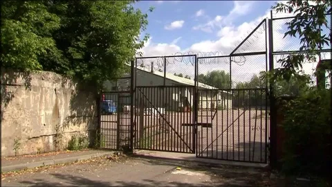 Loaded trucks leave U.S. embassy warehou... | Stock Video | Pond5