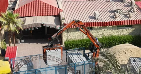 Loading and unloading work is underway a... | Stock Video | Pond5