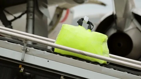 loading baggage into the aircraft using ... | Stock Video | Pond5