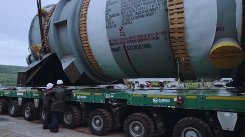 Loading of a chemical reactor in a port ... | Stock Video | Pond5