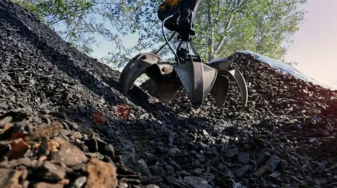 Loading of coal a truck using a hydrauli... | Stock Video | Pond5