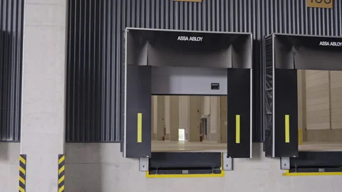 Loading Dock Bay Door Opening at Distrib... | Stock Video | Pond5