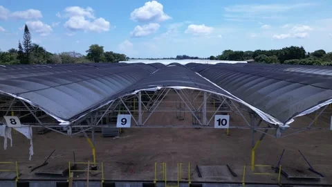 loading docks on the farm. greenhouse an... | Stock Video | Pond5