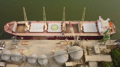 Loading grain into sea cargo vessel in s... | Stock Video | Pond5