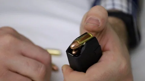 Loading Handgun Magazine. Charging Gun. | Stock Video | Pond5