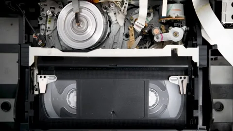 The loading mechanism in a VHS video rec... | Stock Video | Pond5