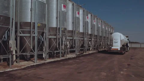 Loading of raw materials at a pig farm, ... | Stock Video | Pond5