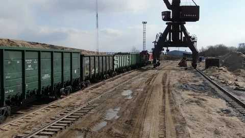 loading sand into rail cars with the hel... | Stock Video | Pond5
