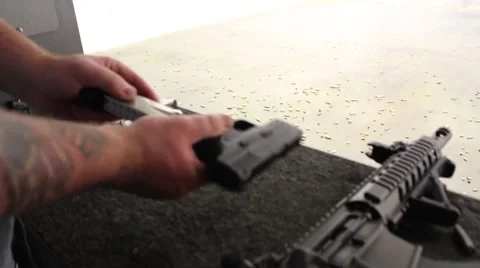 Loading Handgun Stock Video Footage | Royalty Free Loading Handgun ...