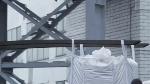 Loading truck with bales of polymer chip... | Stock Video | Pond5