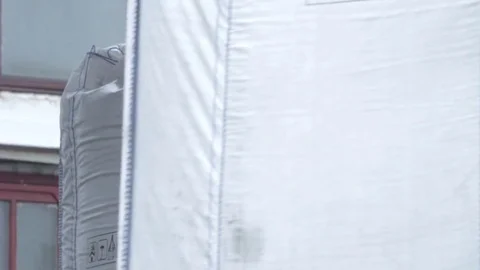 Loading truck with bales of polymer chip... | Stock Video | Pond5