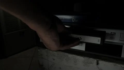 Loading A VHS Tape In A VHS Player With ... | Stock Video | Pond5