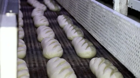 Loaf of bread on the production line in ... | Stock Video | Pond5