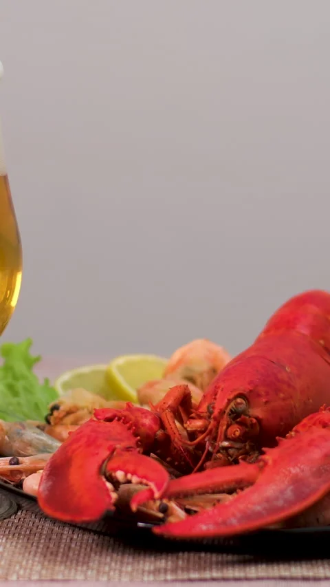 lobster beer Crawfish on plate with beer... | Stock Video | Pond5