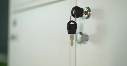Lockers with keys in door lock. Row of p... | Stock Video | Pond5
