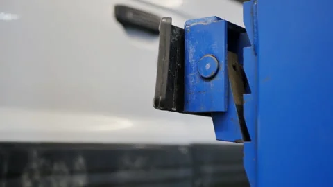 locking mechanism of the car lift when l... | Stock Video | Pond5