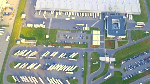 Logistics park with a warehouse - loadin... | Stock Video | Pond5