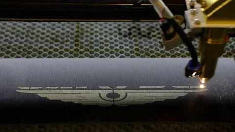 Logo engraving with a laser on a metal p... | Stock Video | Pond5