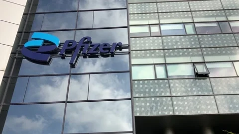 Logo Pfizer Inc. on building facade | Stock Video | Pond5