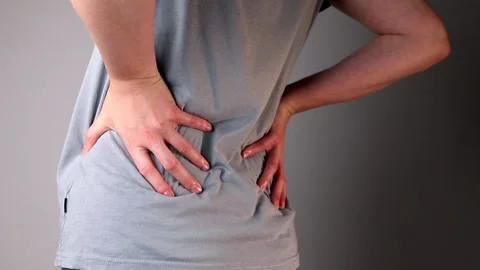 Loin ache, lower back and low spine pain... | Stock Video | Pond5