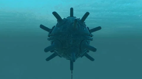 A lone underwater sea mine floating near... | Stock Video | Pond5