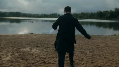 Lonely Man Walking Fast with Letter in H... | Stock Video | Pond5