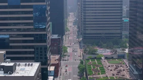 Long aerial zoom of green spaces and roa... | Stock Video | Pond5