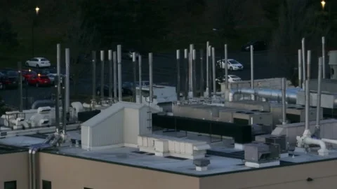 Long aerial zoom of steel smoke stacks o... | Stock Video | Pond5