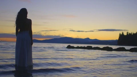 Long back view shot of woman standing an... | Stock Video | Pond5