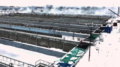 Long basins with swirling water and ice ... | Stock Video | Pond5