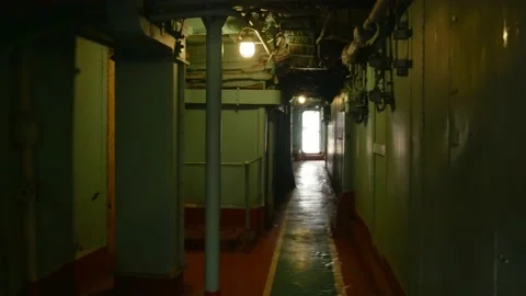 long empty metal corridor on a warship. ... | Stock Video | Pond5