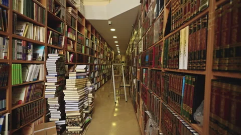 Long Library Corridor with Books on Shel... | Stock Video | Pond5