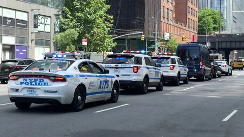 Long line convoy of NYPD Police Cars wit... | Stock Video | Pond5