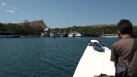 Long Shot from boat as it approaches Rin... | Stock Video | Pond5