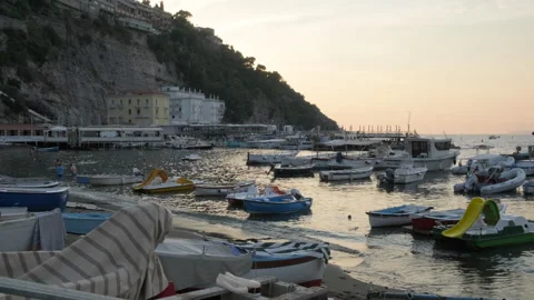 Long shot of boats and a small marina wi... | Stock Video | Pond5
