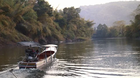long tail boat pulling bamboo raft in th... | Stock Video | Pond5
