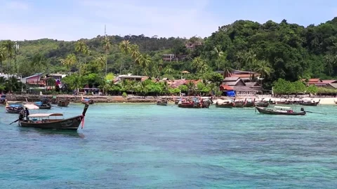 Longtail boat boats at the beautiful fam... | Stock Video | Pond5