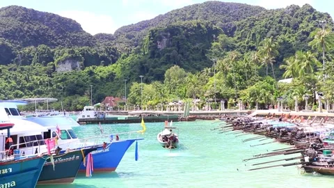 Longtail boat boats at the beautiful fam... | Stock Video | Pond5