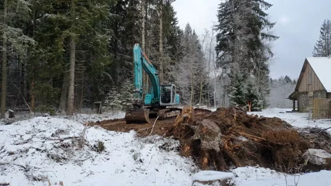 A look of a blue excavator digging soil ... | Stock Video | Pond5