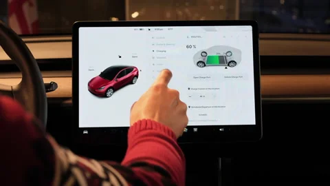 look at the Tesla Model Y car menu, cond... | Stock Video | Pond5