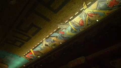 Looking up Arched Tunnel Graffiti Bricks... | Stock Video | Pond5