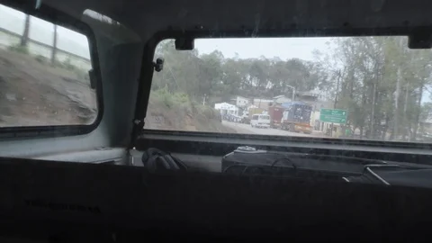 Looking back view of a car leaving a sma... | Stock Video | Pond5