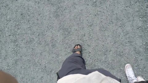 Looking down point of view at shoes whil... | Stock Video | Pond5