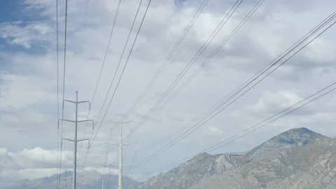Looking up at massive power lines with m... | Stock Video | Pond5
